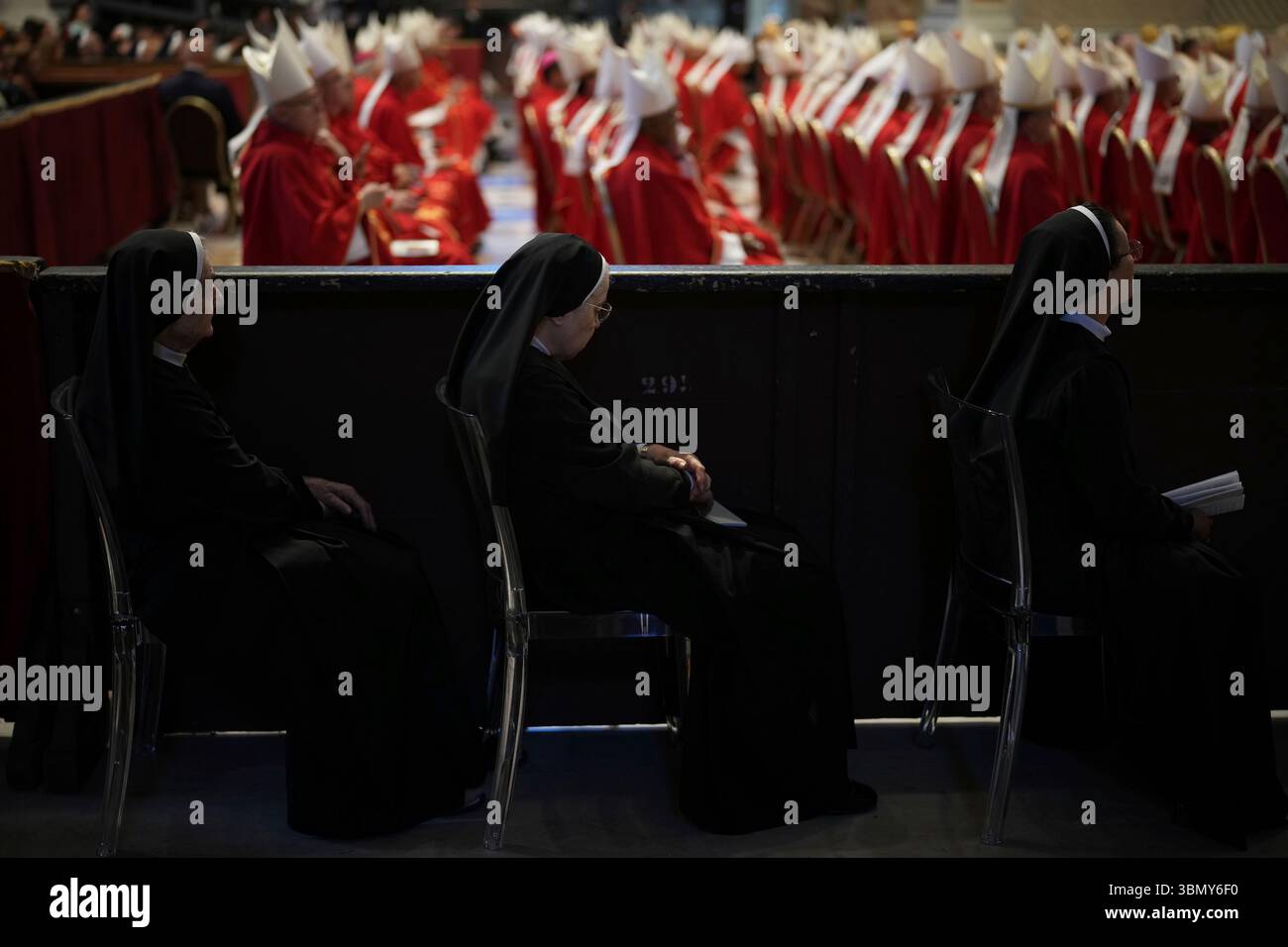 Nuns follow a Mass celebrated by Pope Leo XIV in St. Peter's Basilica ...