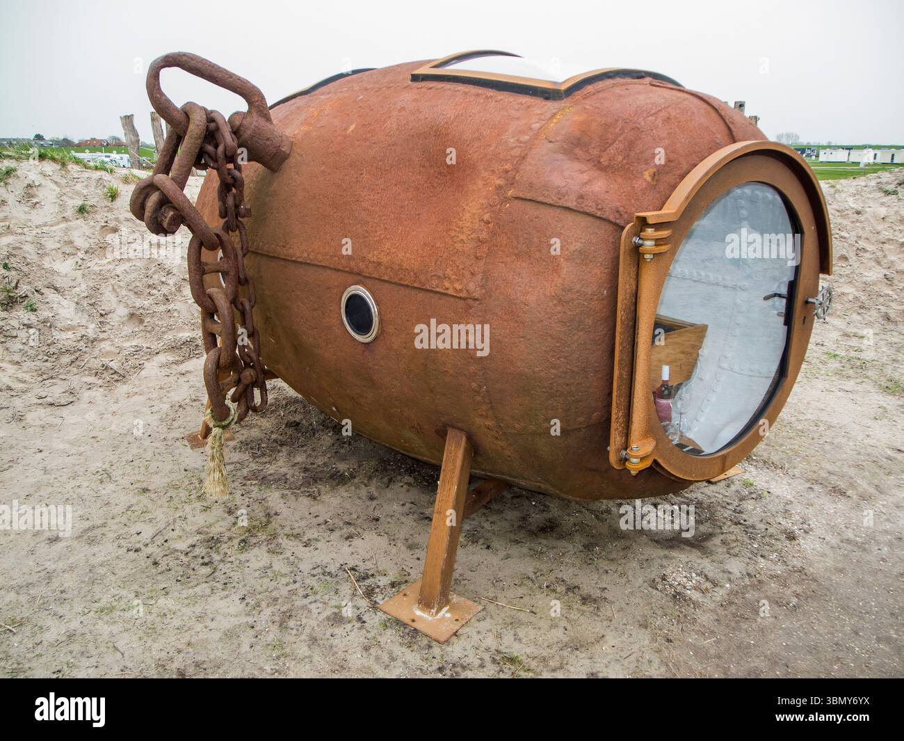 View of an old rusty buoy converted into an adventure overnight stay on ...