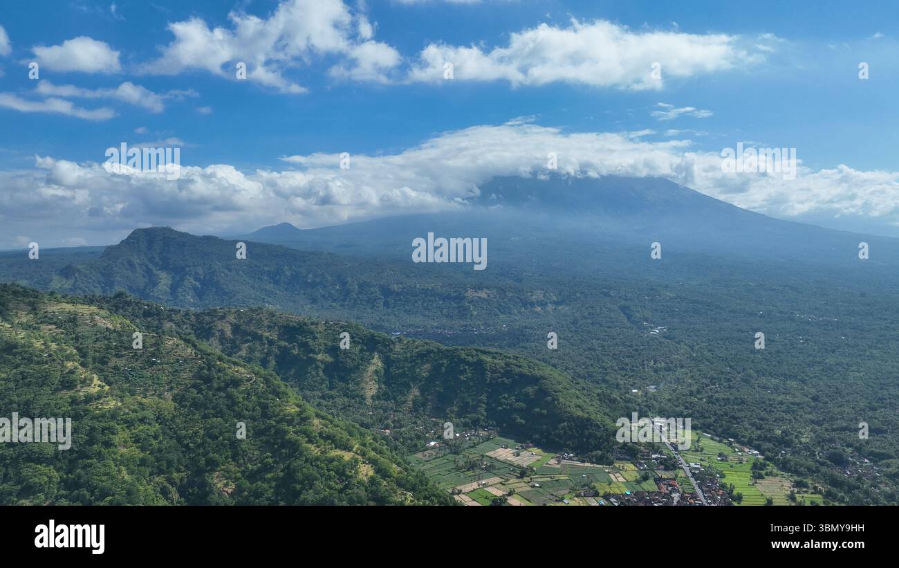 A breathtaking view of lush green valleys and distant villages at the ...