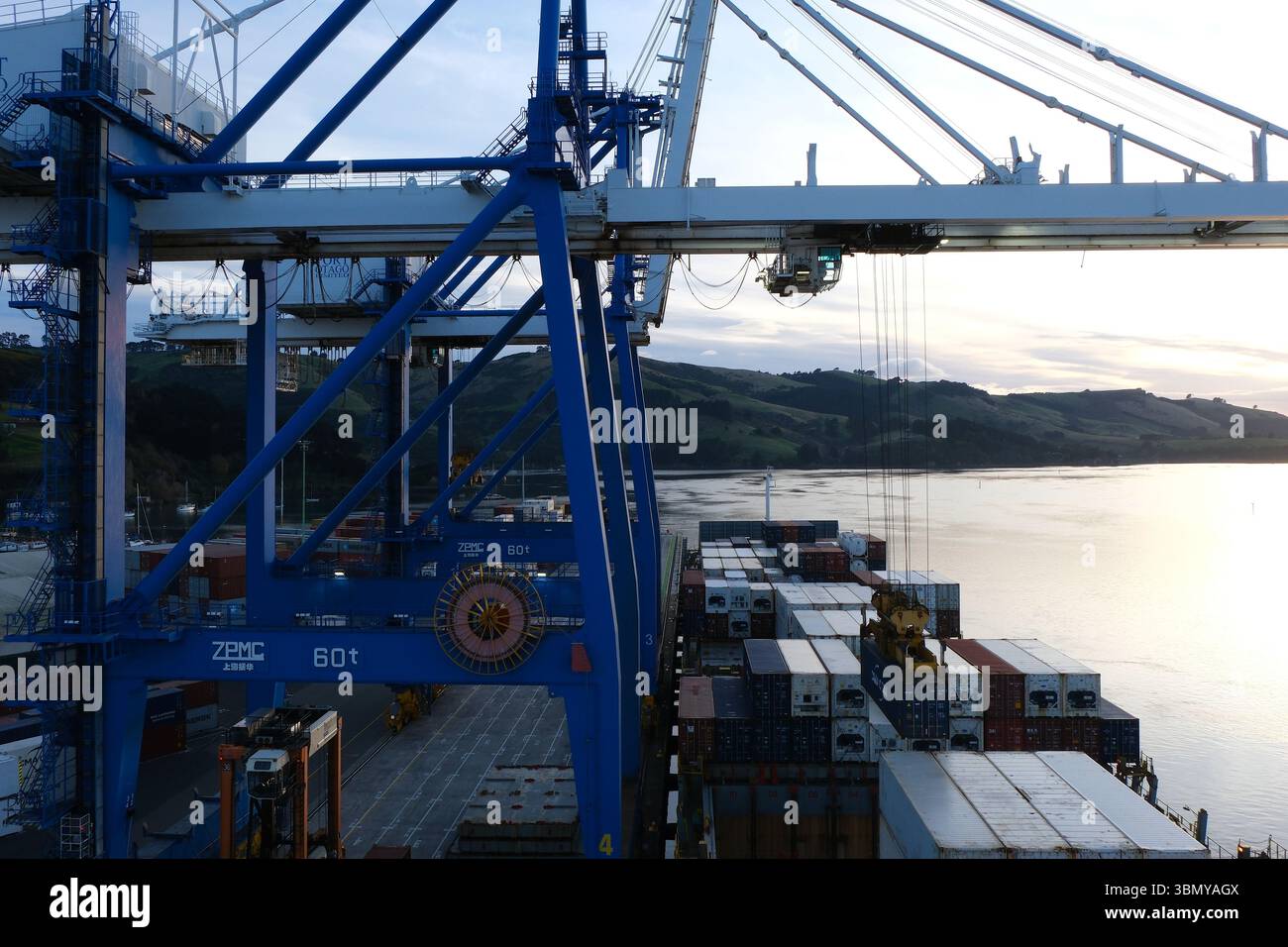 Container vessel during cargo operation loading and discharging by ...