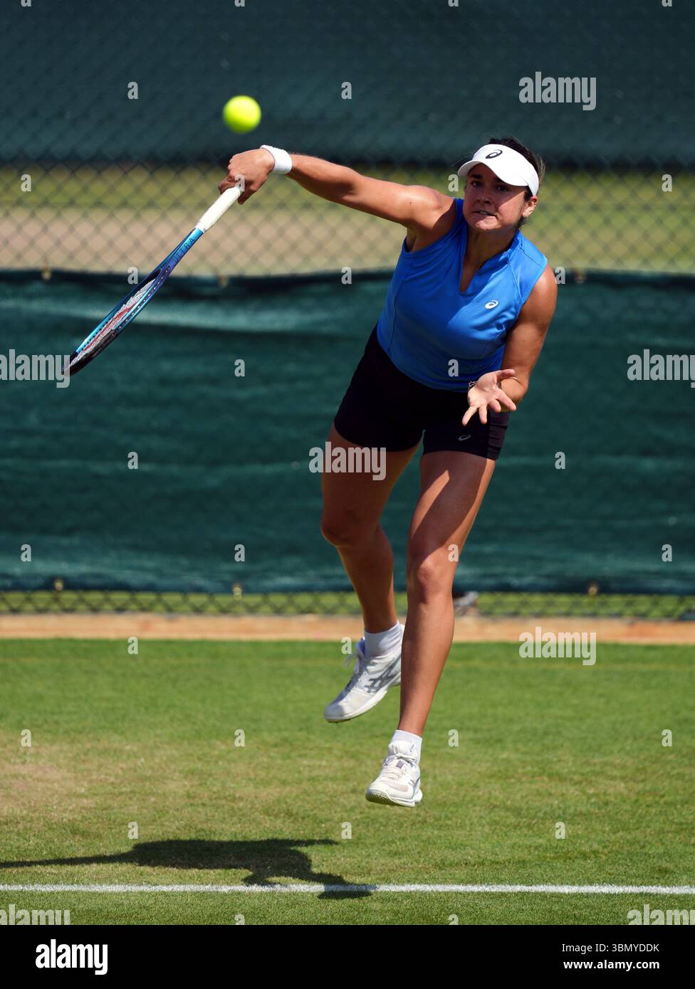 Caroline Dolehide during a practice session at the All England Lawn ...