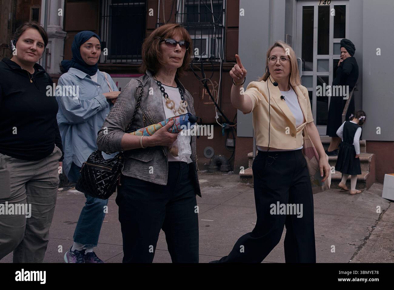 Frieda Vizel, right, guides participants during her walking tour of the ...