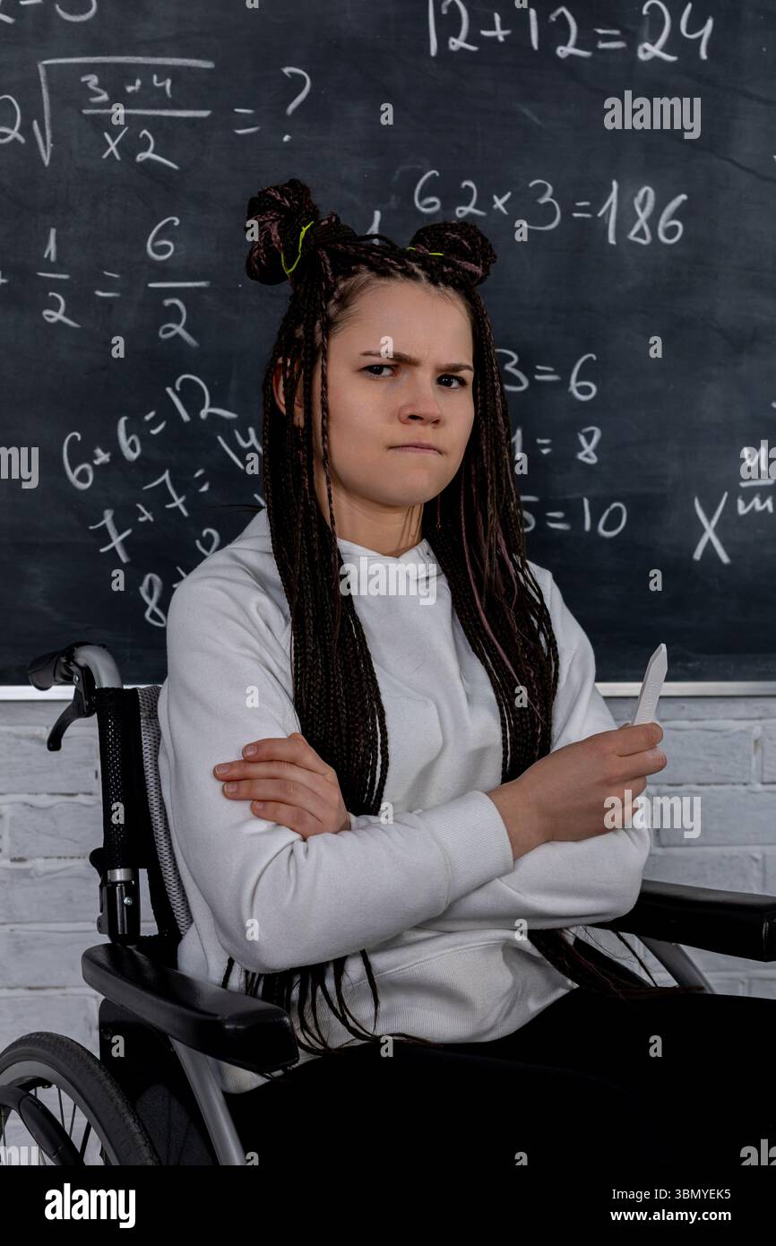 A Confident Student in a Wheelchair Successfully Solving Complex Math ...