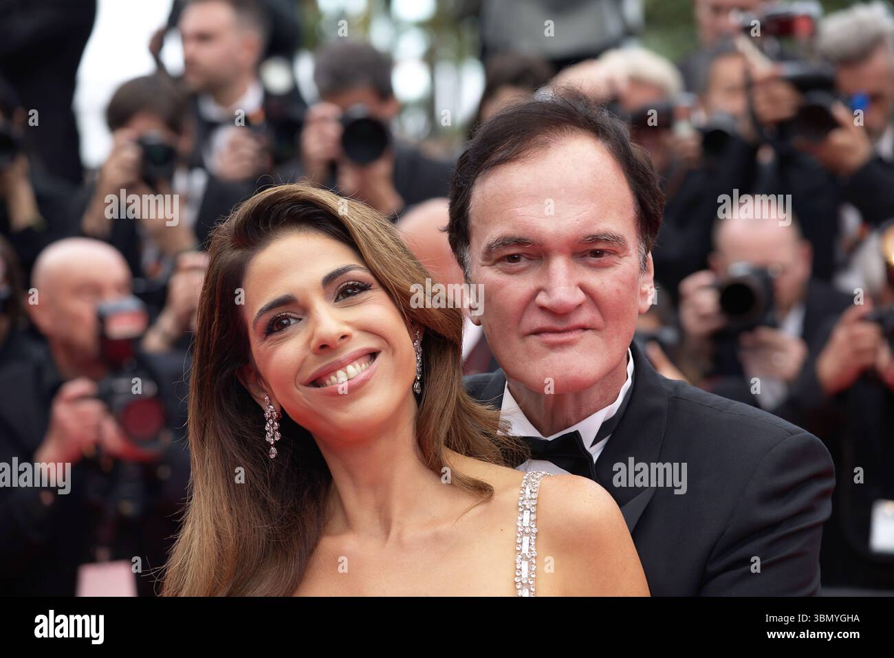 Director Quentin Tarantino and his wife Daniella Pick at the red carpet ...