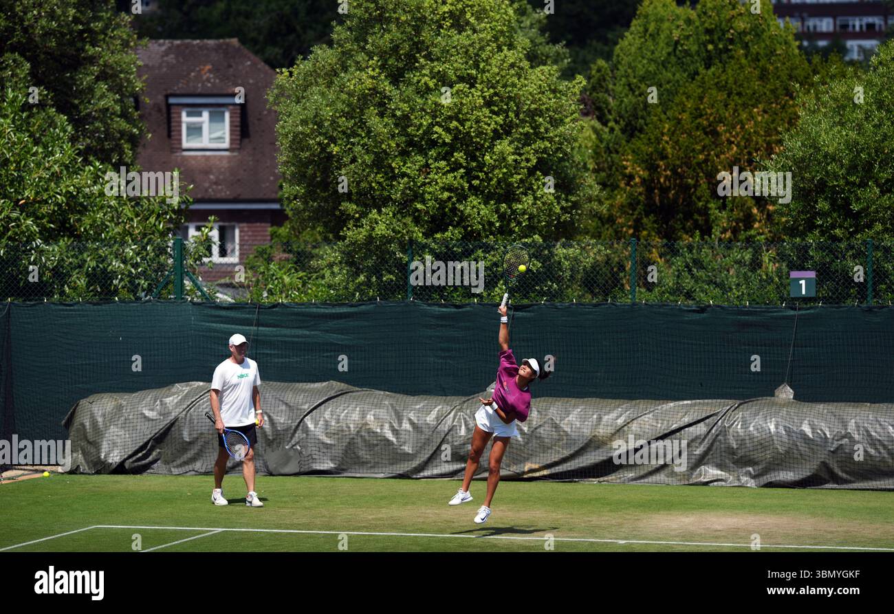 Emma Raducanu with coach Mark Petchey during a practice session at the ...