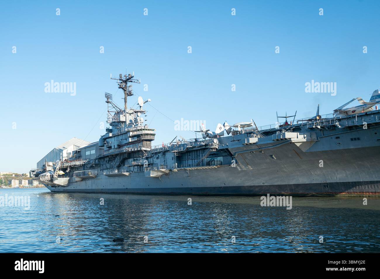 Aircraft carrier home of the Intrepid Air and Space museum docked on a ...