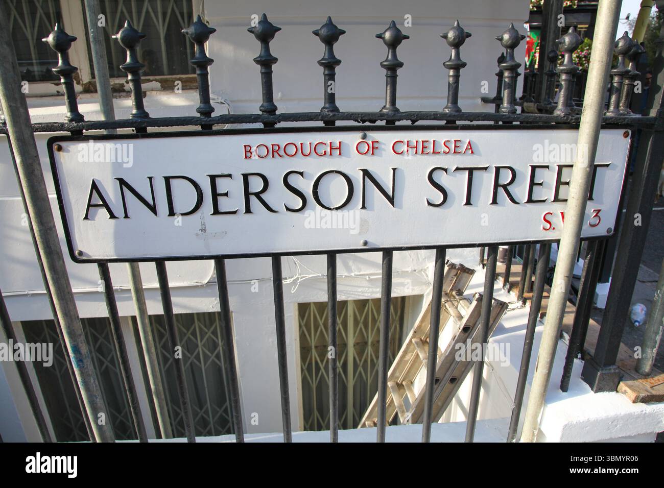London street sign "Borough of Chelsea, Anderson Street" attached to a ...