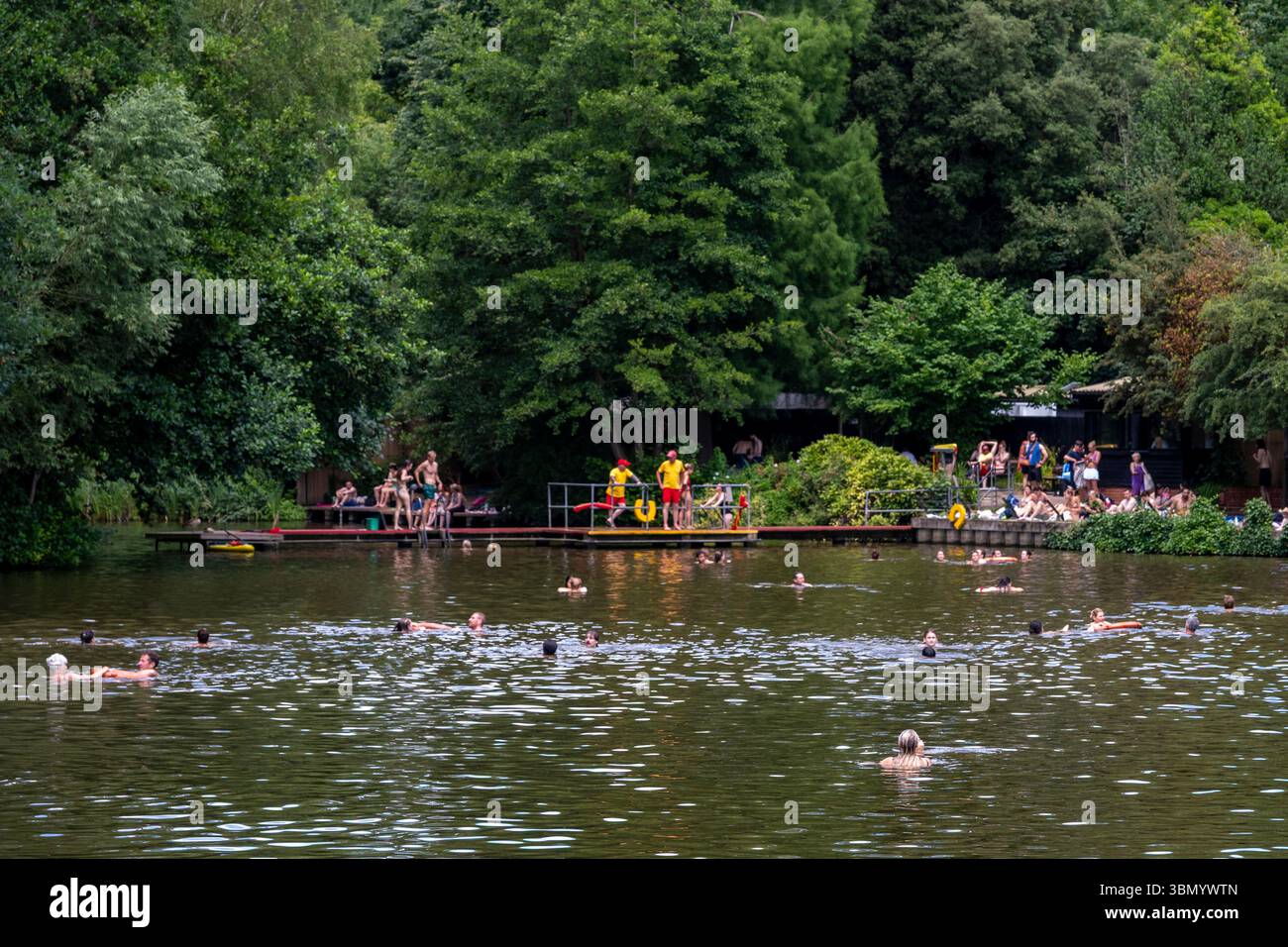 London, UK. 29 June 2025. UK Weather : People swimming in the bathing ...
