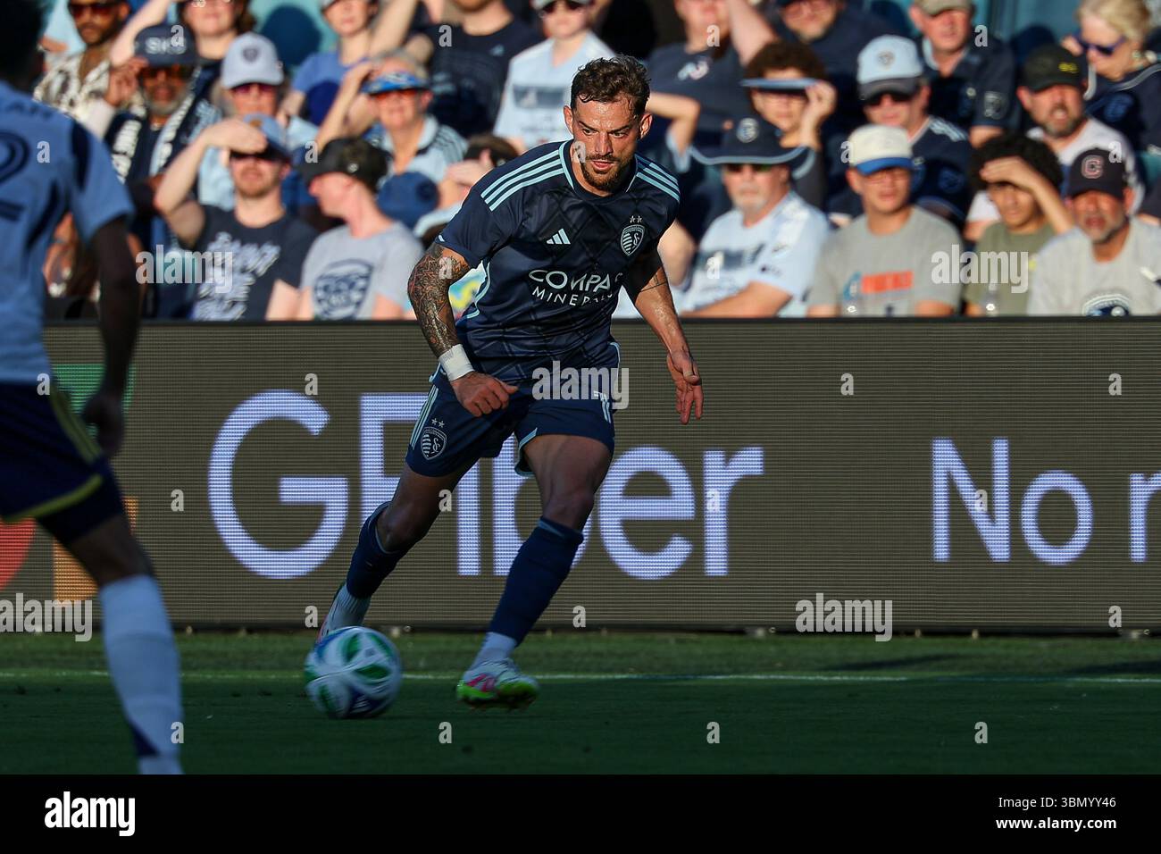 June 28, 2025: Sporting Kansas City defender Tim Leibold (14) dribbles ...