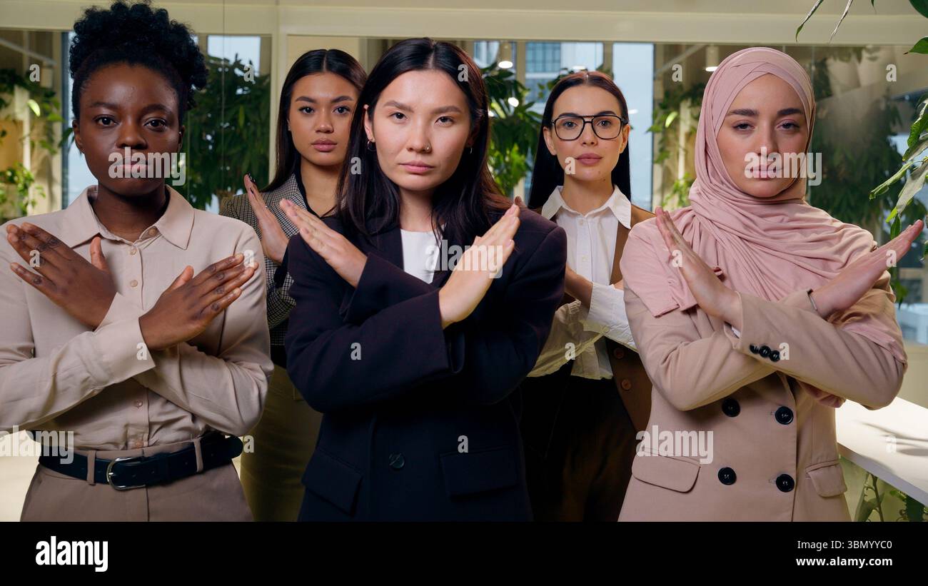 Negative strict serious multiethnic hi-res stock photography and images ...