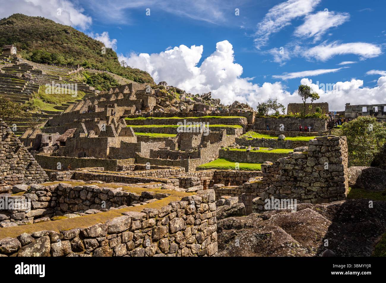 Machu Picchu, the legendary Inca city in Peru, stands amidst lush ...