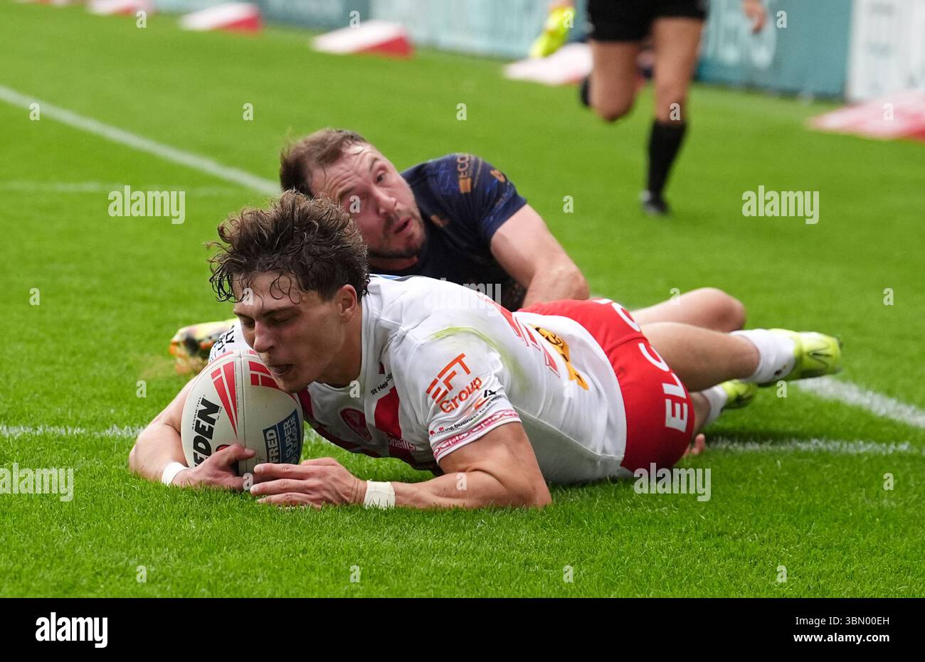 St Helen's Owen Dagnall scores their second try during the Betfred ...