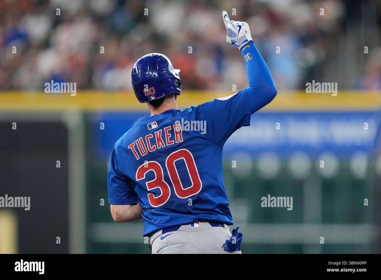 Chicago Cubs' Kyle Tucker runs the bases after hitting a home run ...
