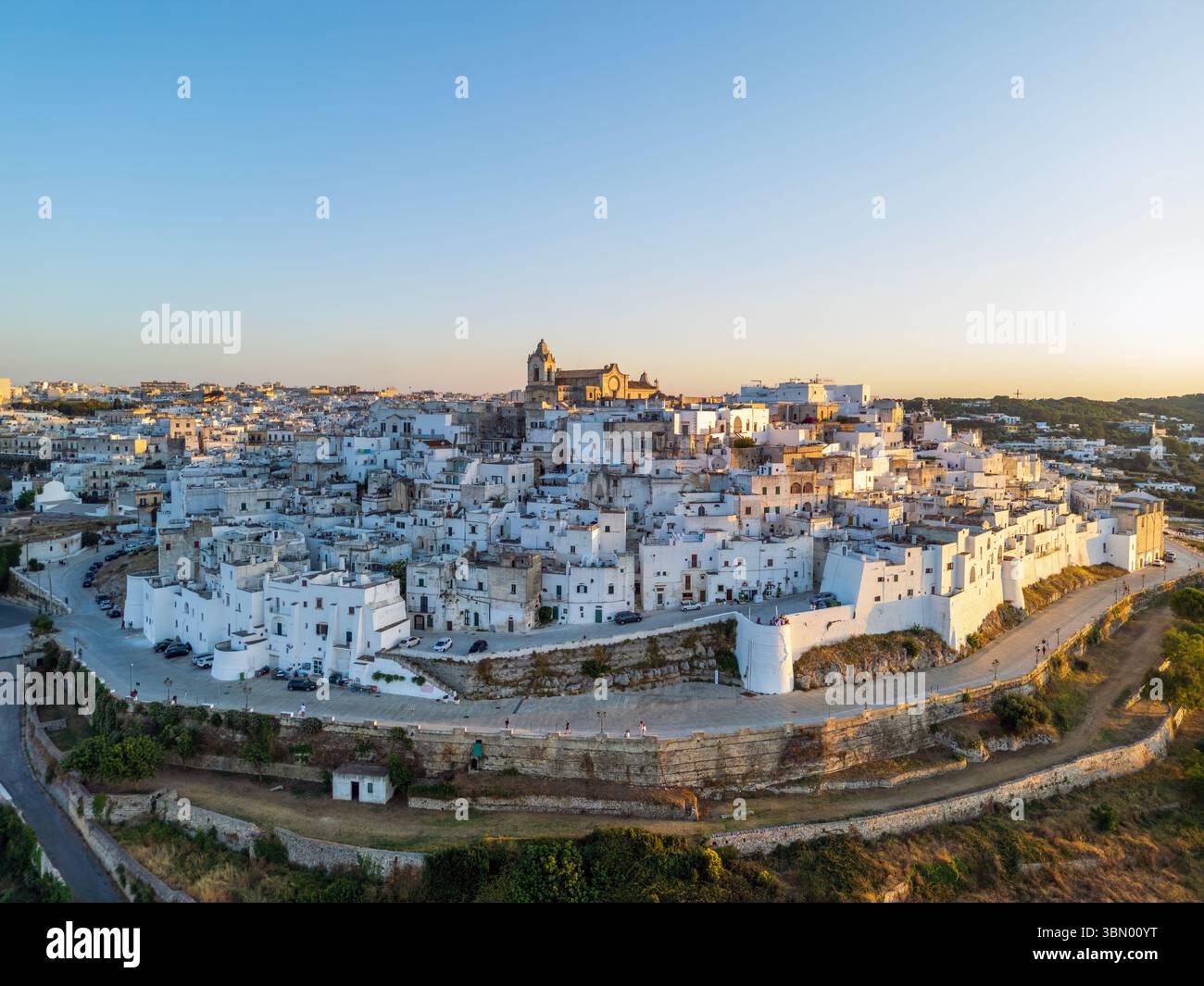 Aerial view of the city of Ostuni, or the White City, illuminated at ...