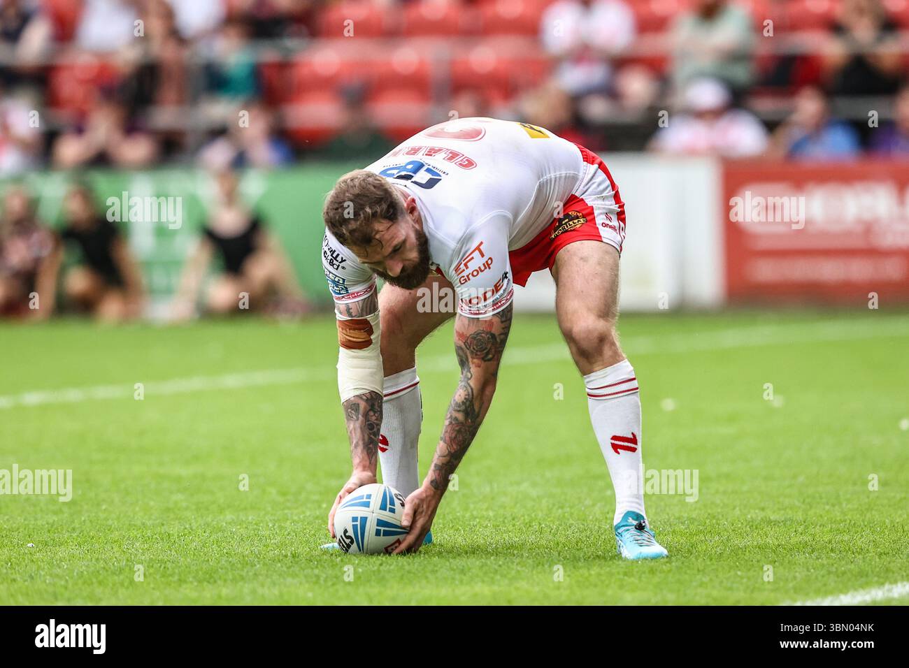 Daryl Clark of St. Helens goes over for a try during the Betfred Super ...