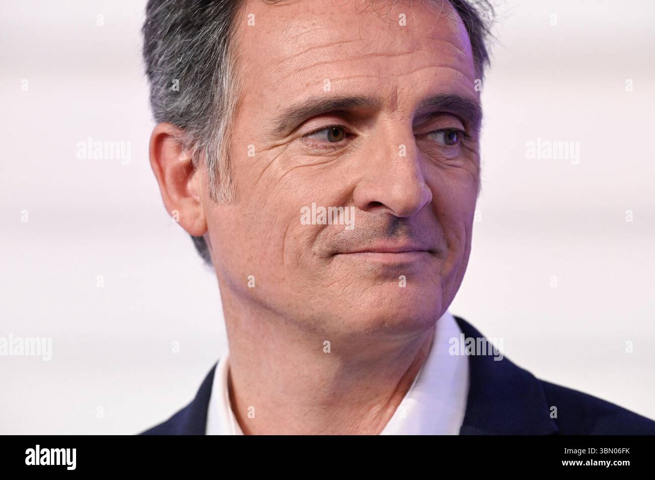 Grenoble mayor Eric Piolle poses for pictures ahead of an interview for ...