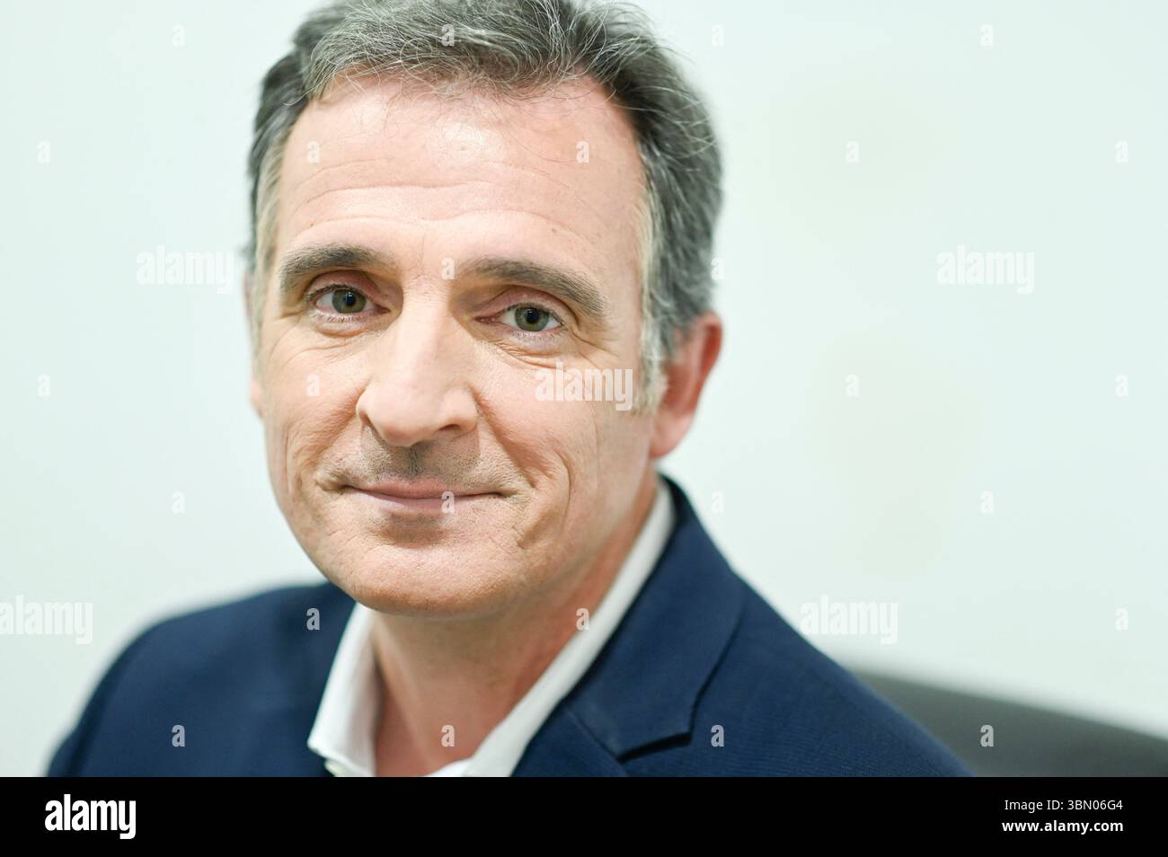 Grenoble mayor Eric Piolle poses for pictures ahead of an interview for ...