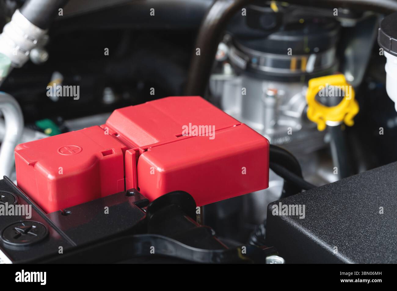 Car accumulator terminal of battery on engine part background Stock ...