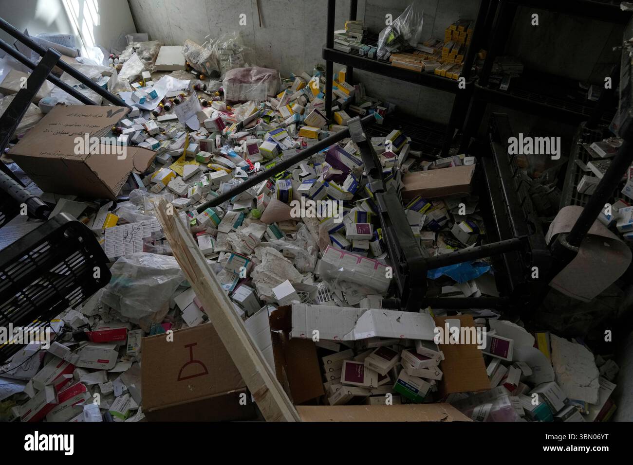 Medicine boxes lie on the ground at the clinic building of the Evin ...