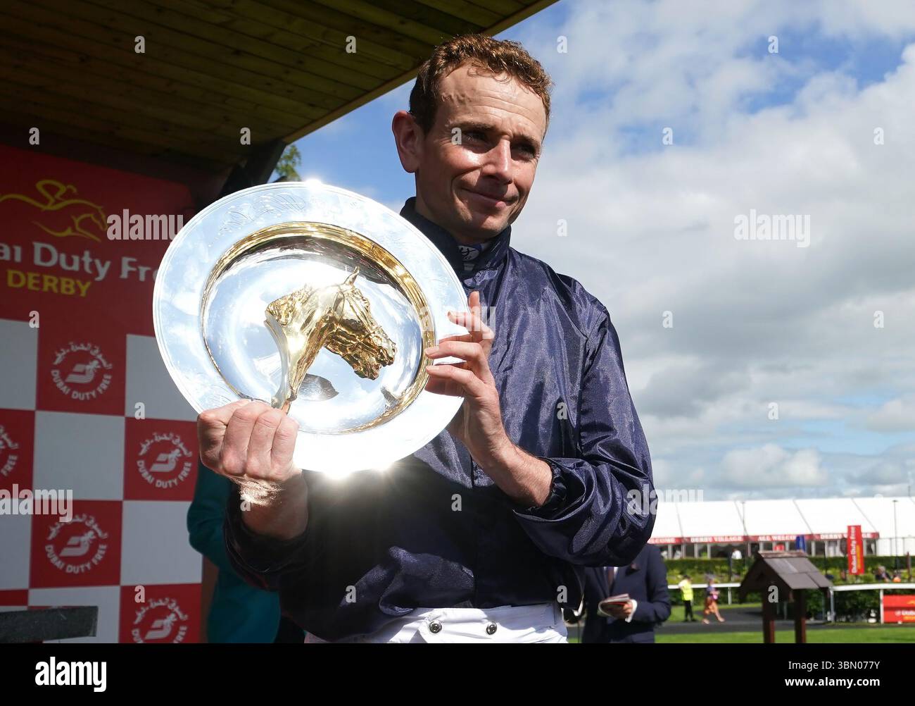 Ryan Moore with the trophy after winning the Dubai Duty Free Irish ...