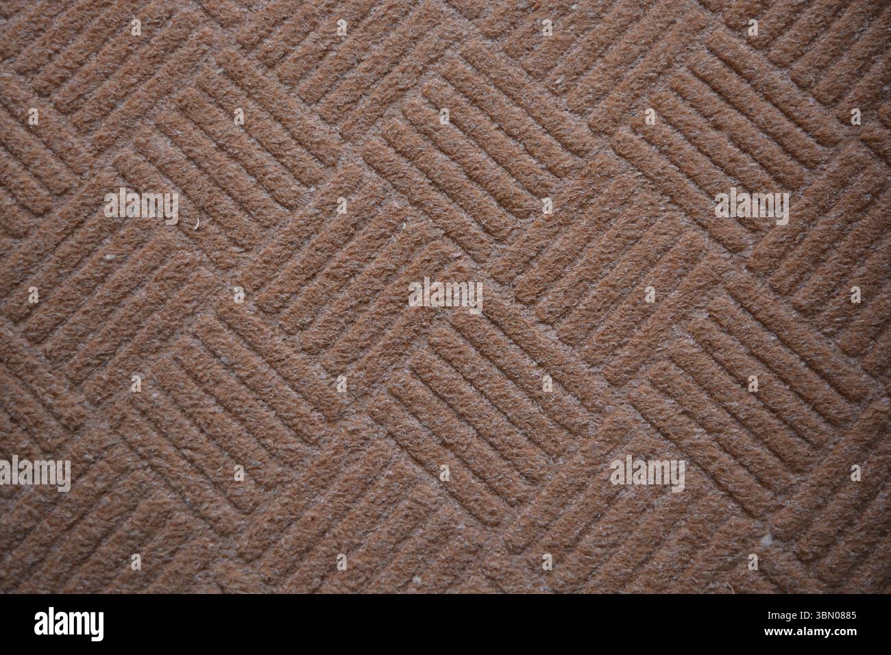 Synthetic thread backgrounds. Structured, textured brown woven rug with ...
