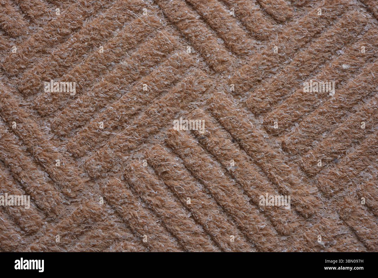 Synthetic thread backgrounds. Structured, textured brown woven rug with ...