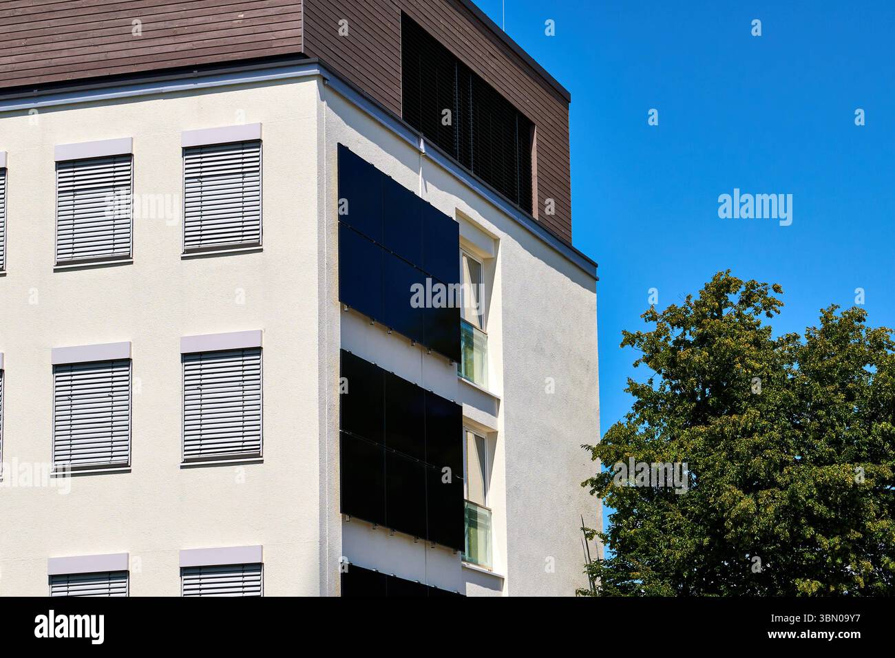 Bavaria, Germany - June 28, 2025: Solar panels on building facades ...