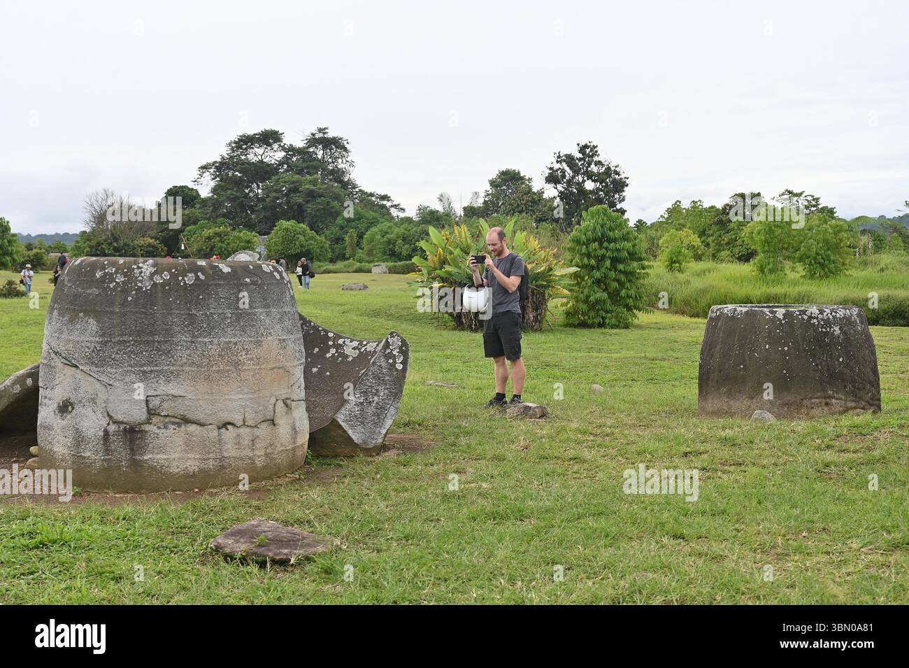 Poso, Indonesia. 27th June, 2025. Visitors observe Kalamba, or giant ...