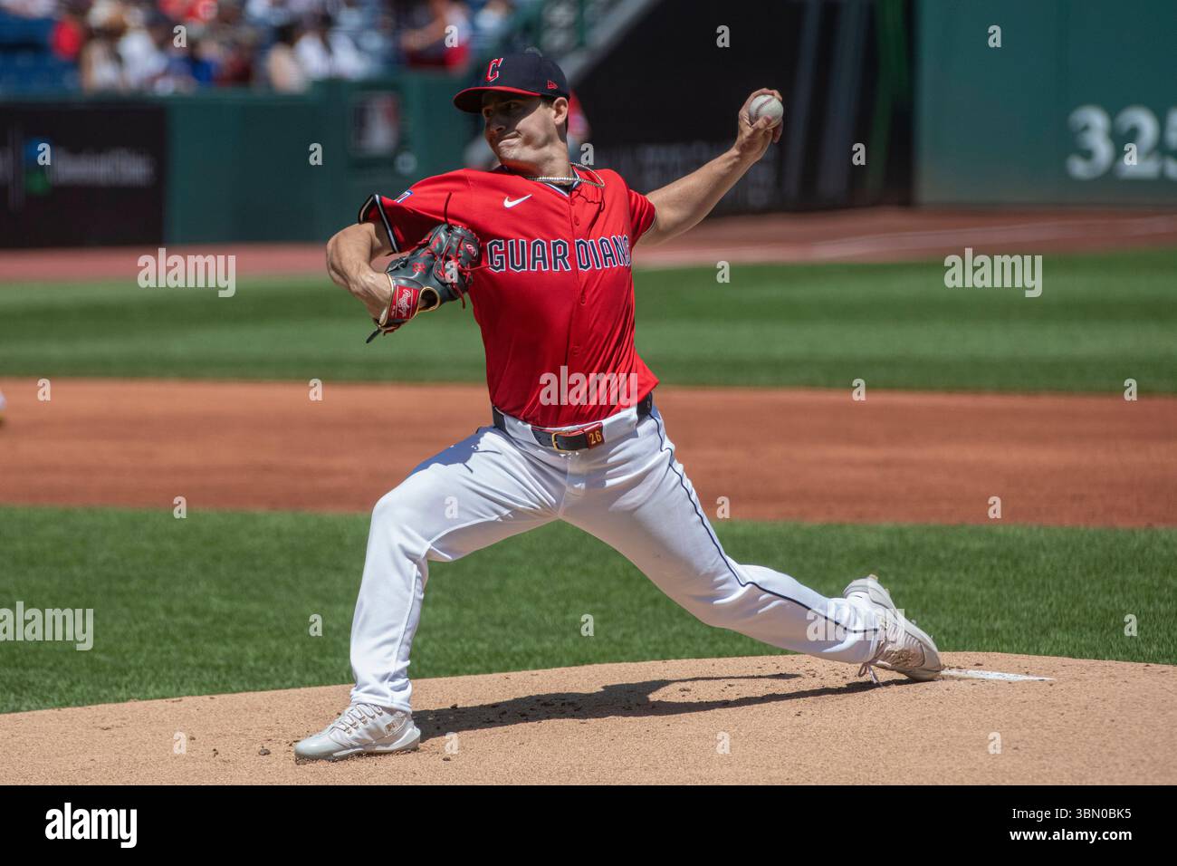 Cleveland Guardians starting pitcher Logan Allen delivers against the ...