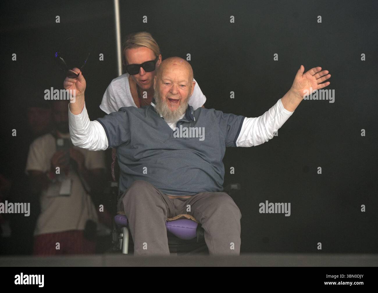 Michael Eavis on stage as a guest of Rod Stewart on the Pyramid Stage ...