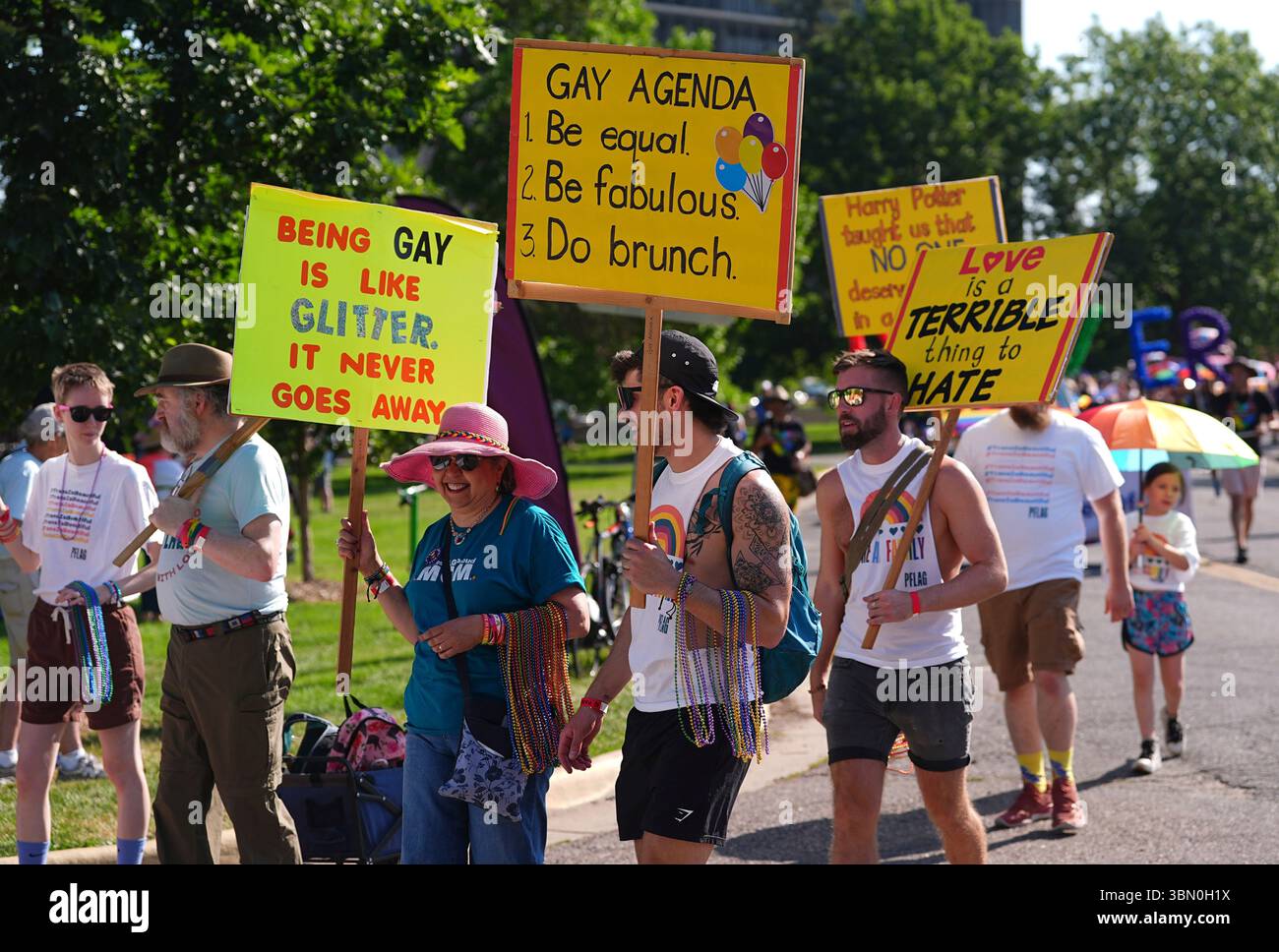 Marchers head out from Cheesman Park to take part in a parade to mark ...