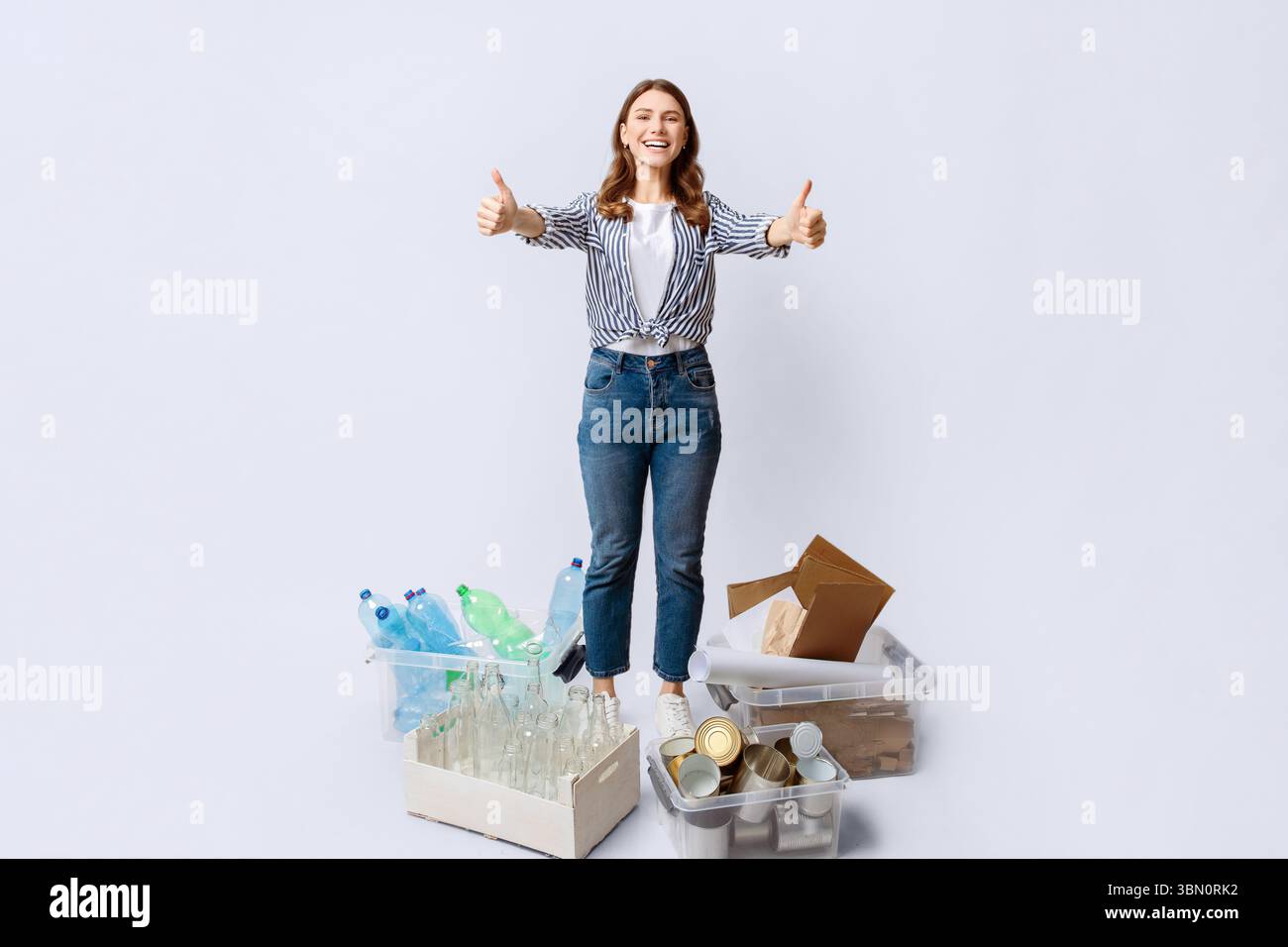 Materials Recycling Concept. Happy Woman Standing Next To Containers ...