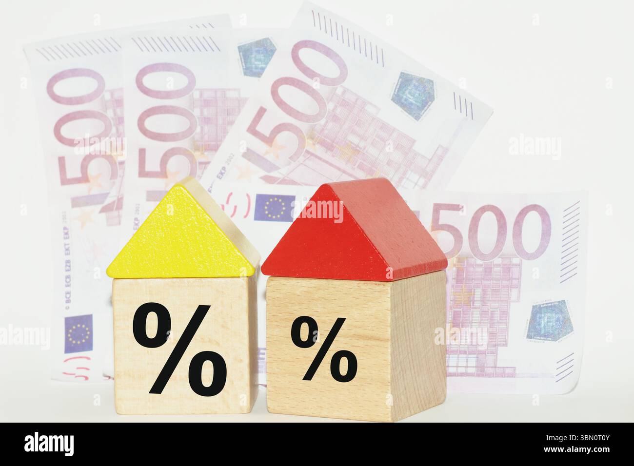 House models with the percentage symbol Stock Photo - Alamy