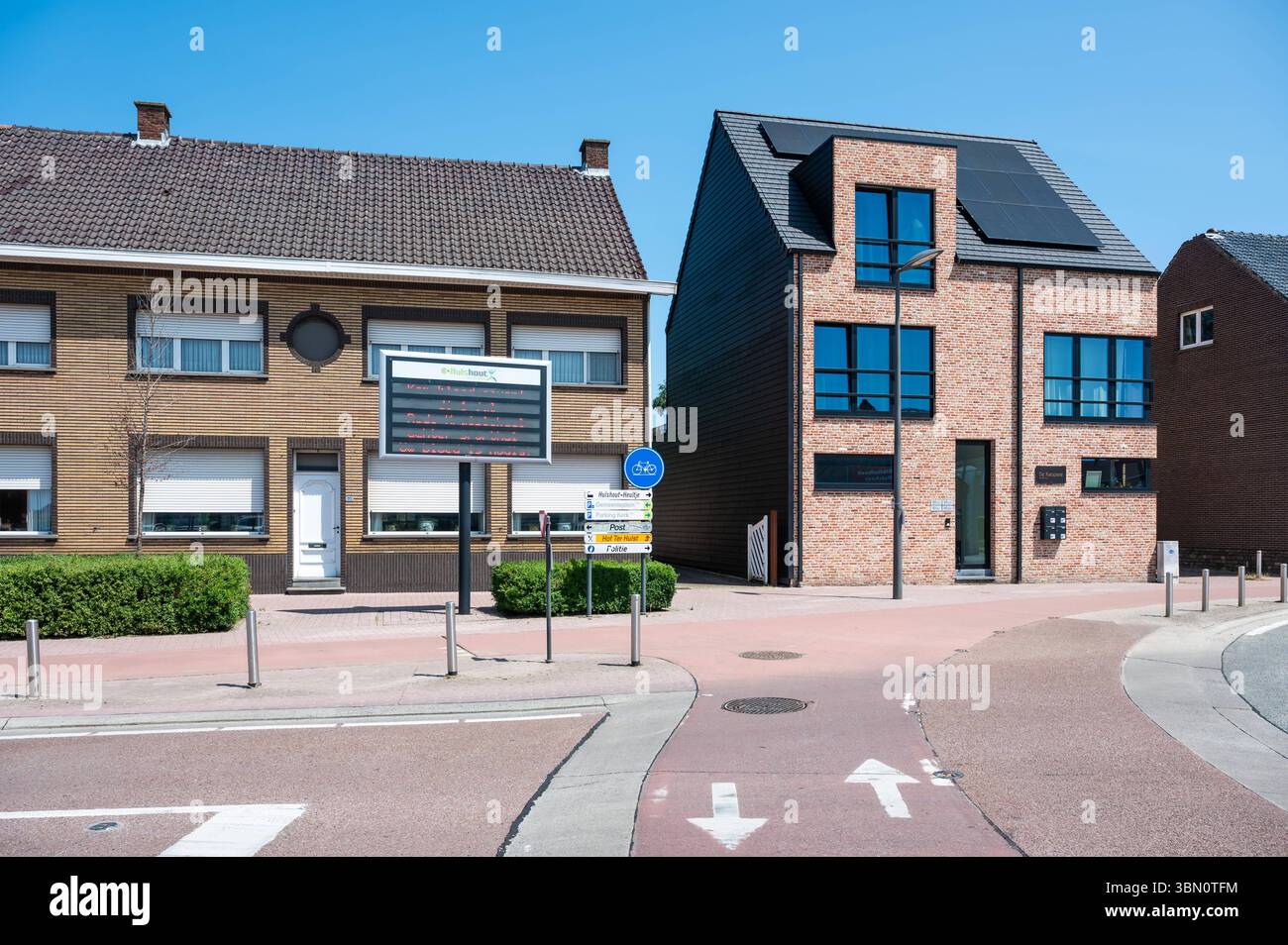 Semi detached houses with solar cells on the rooftop in a residential ...