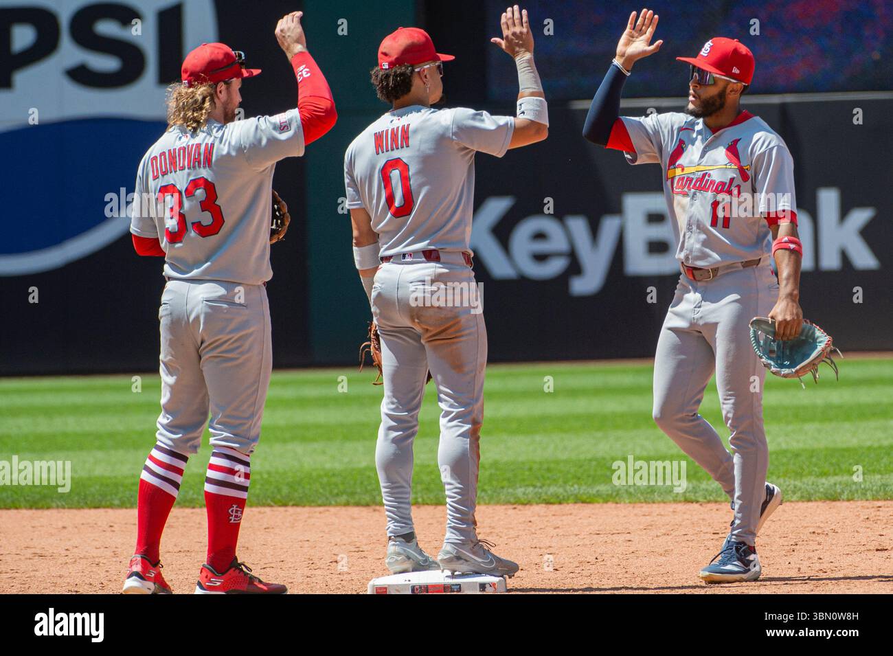 St. Louis Cardinals' Masyn Winn (0) and Brendan Donovan (33) greet ...