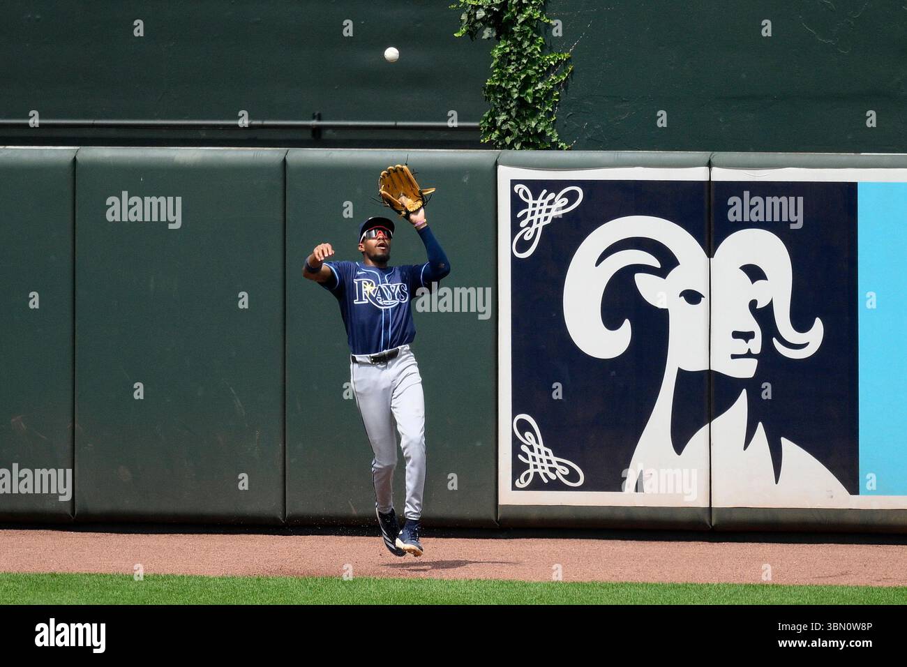 Tampa Bay Rays center fielder Chandler Simpson prepares to make a catch ...