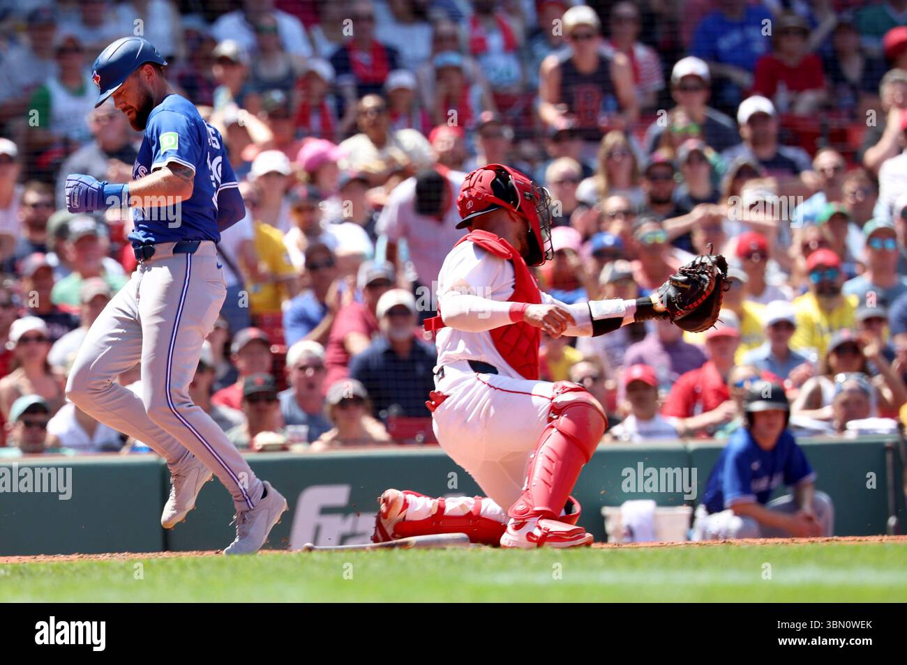 Toronto Blue Jays Nathan Lukes scores ahead of the throw to Boston Red ...