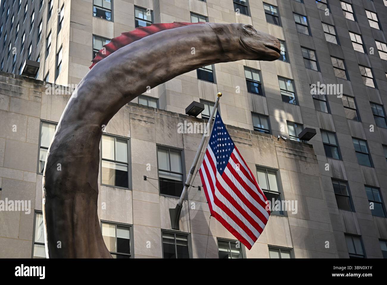 Photo by: NDZ/STAR MAX/IPx 2025 6/28/25 A 5-story Titanosaurus towers ...