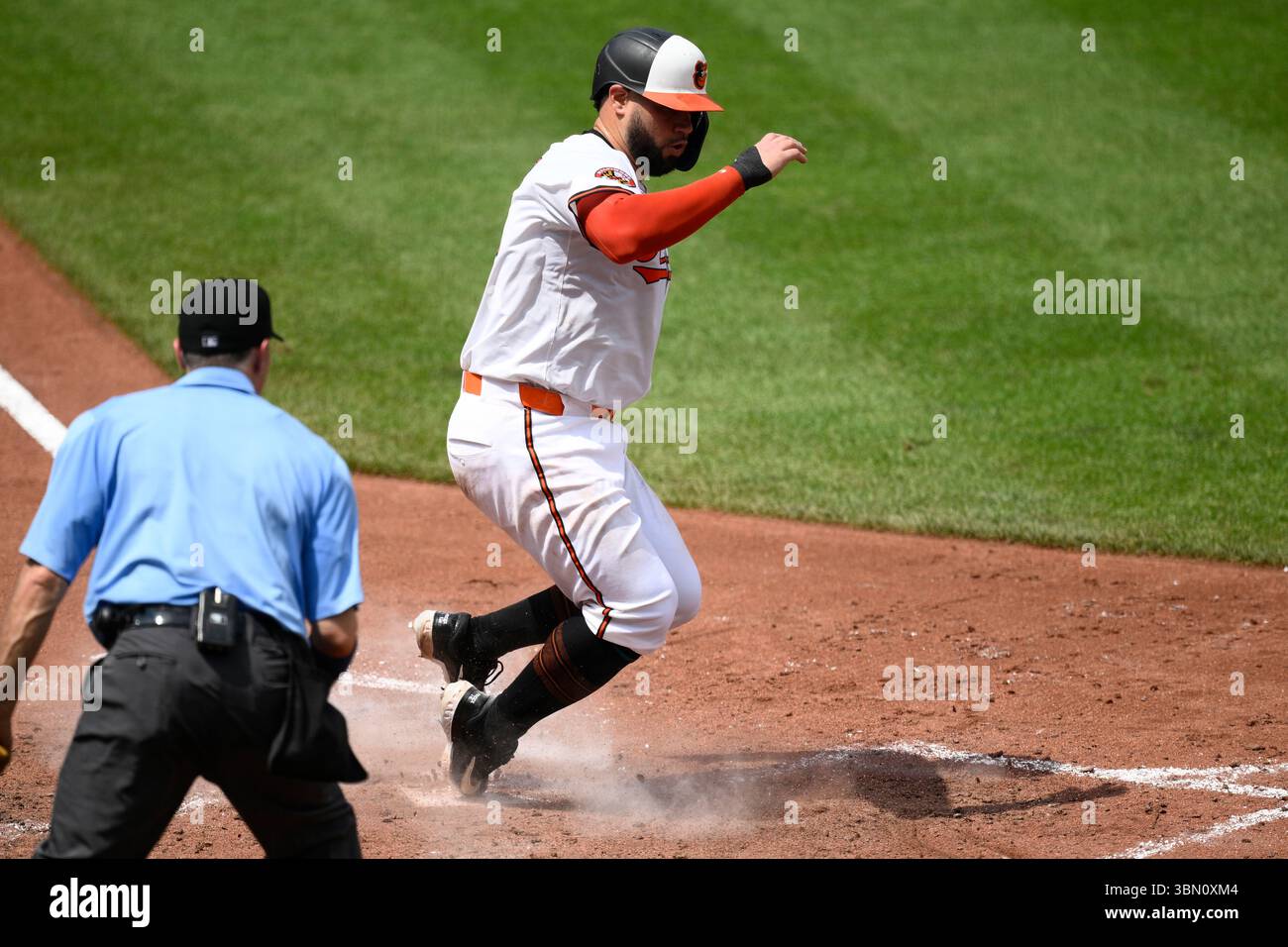 Baltimore Orioles' Gary Sanchez scores on a single by Coby Mayo during ...
