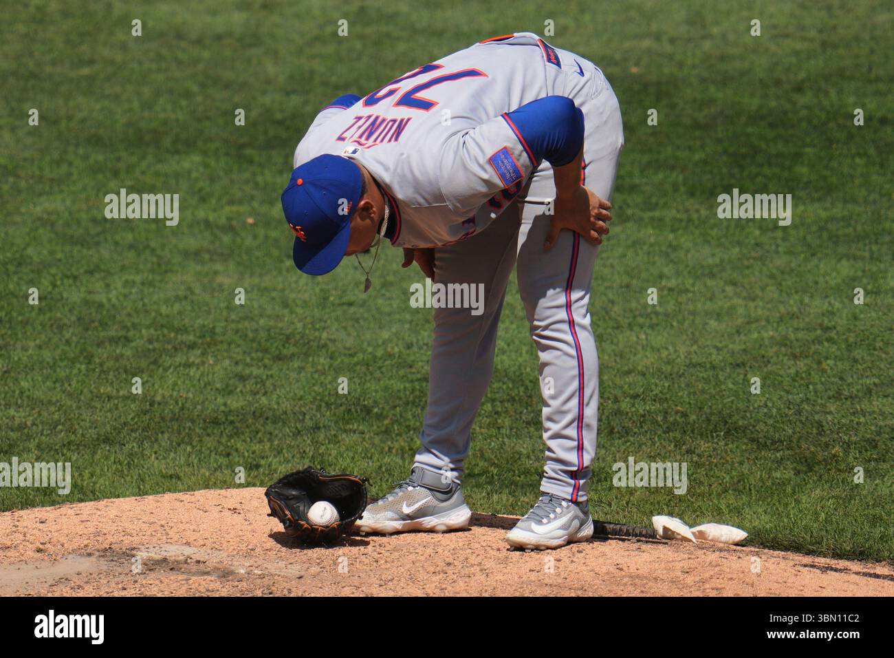 New York Mets pitcher Dedniel Núñez collects himself after giving up a ...