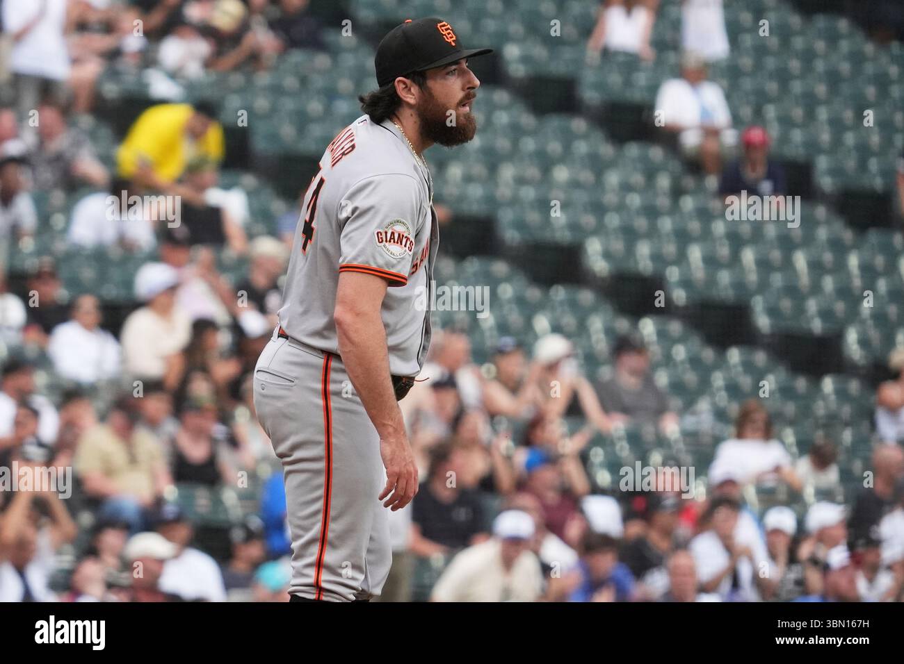 San Francisco Giants relief pitcher Ryan Walker looks to the outfield ...