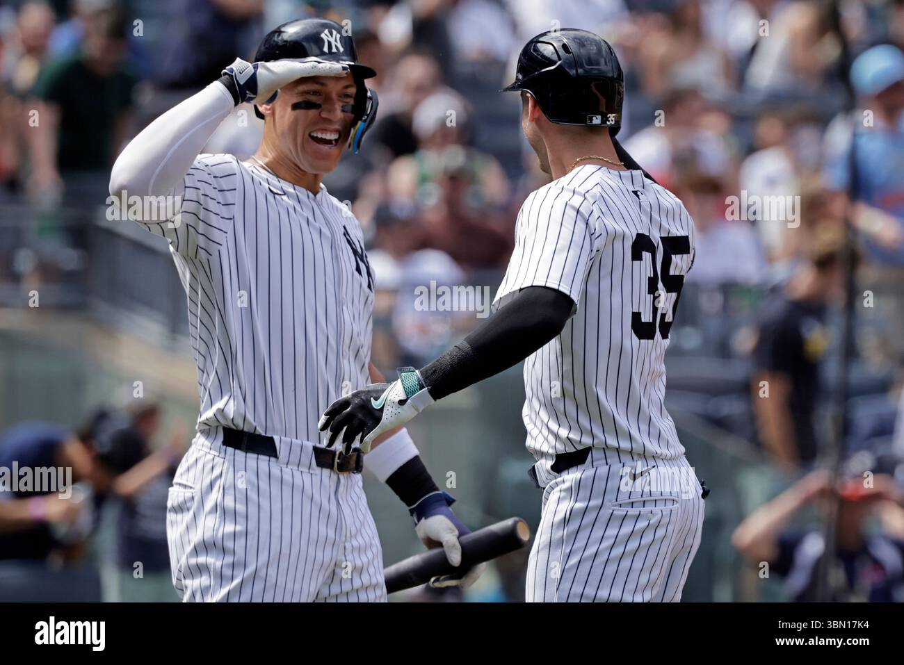 New York Yankees' Cody Bellinger (35) is congratulated by Aaron Judge after hitting a two-run ...