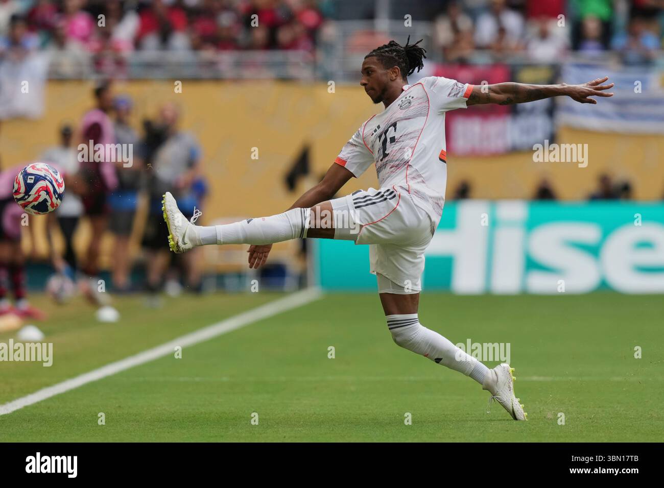 Bayern Munich's Michael Olise stretches for the ball during the Club ...
