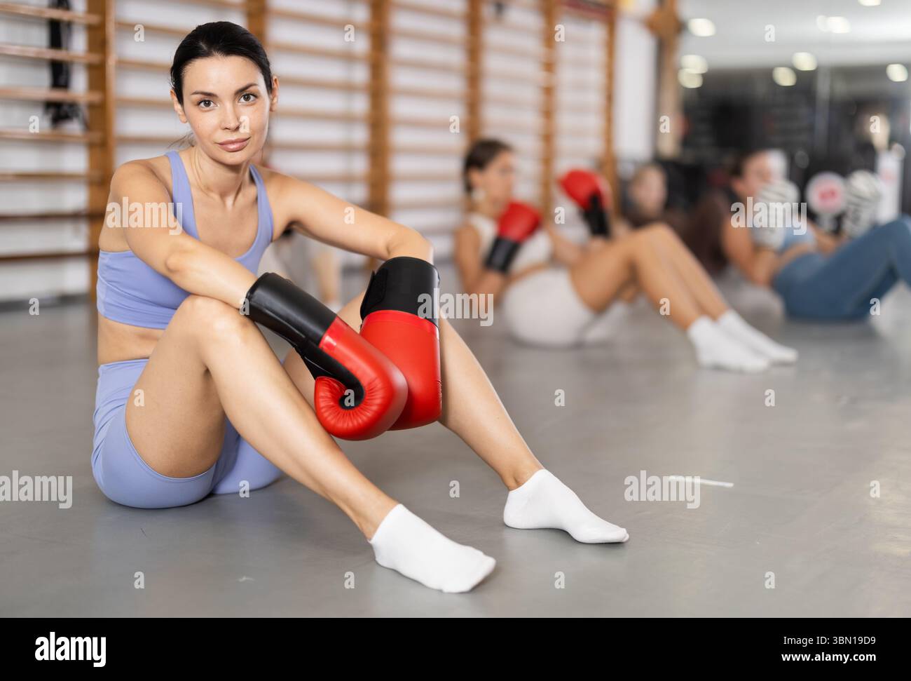 women doing abdominal exercise in boxing gloves Stock Photo - Alamy
