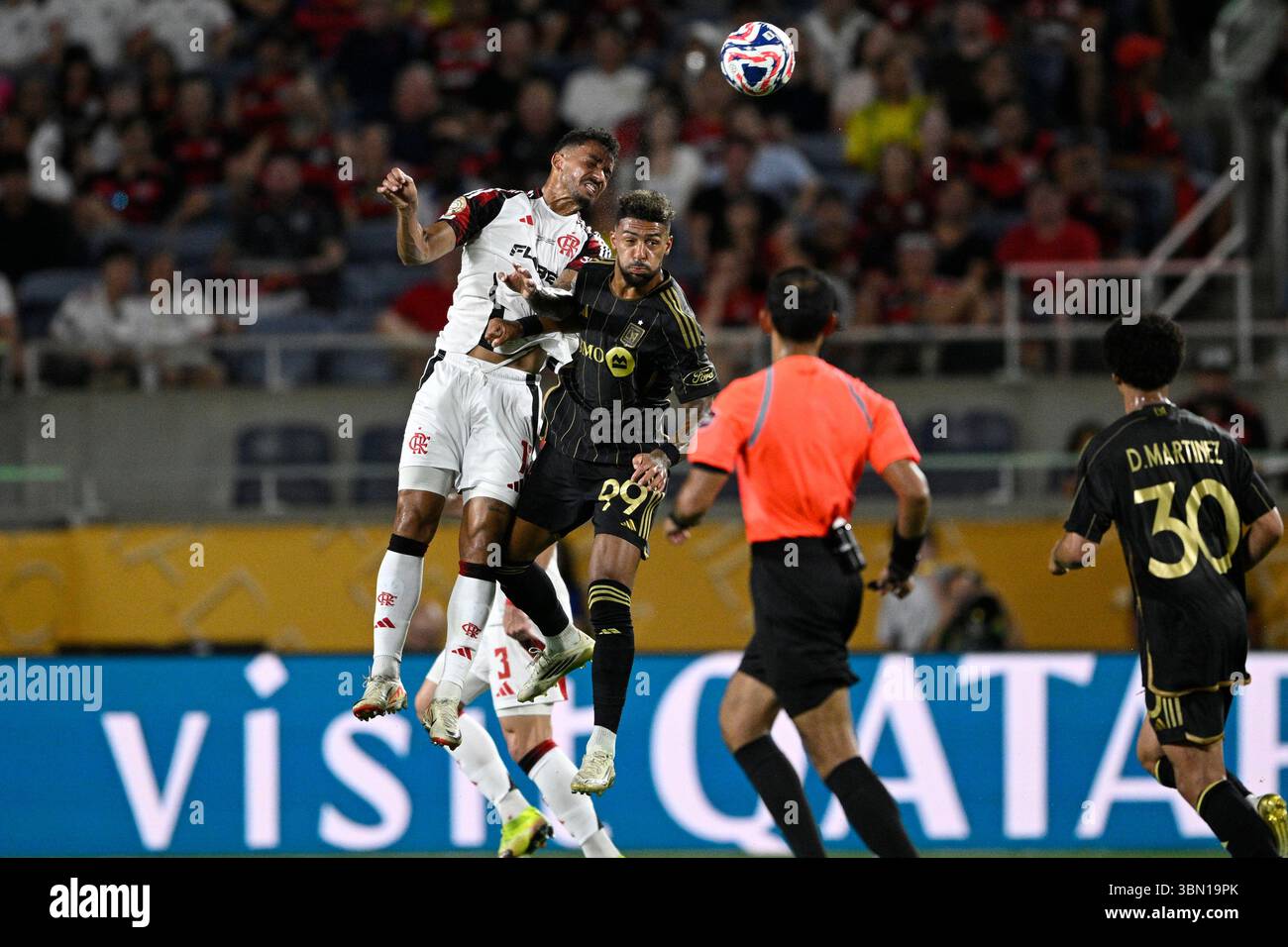 Flamengo's Danilo, left, heads a ball next to Los Angeles FC's Denis ...