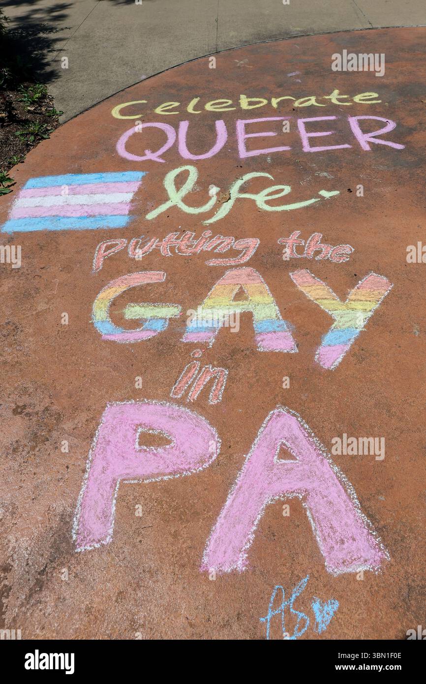 A chalk drawing is seen at Market Square during the Port Pride rally in ...