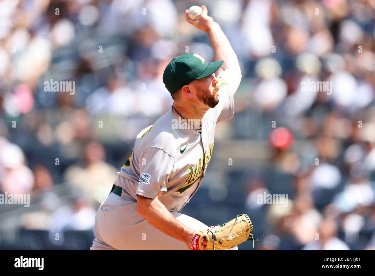 BRONX, NY - JUNE 29: Hogan Harris #36 of the Athletics pitches during ...