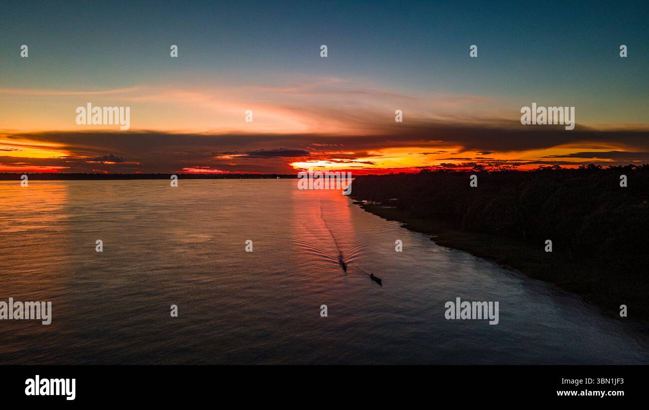 A stunning sunset over the Amazon River in Leticia, Colombia ...
