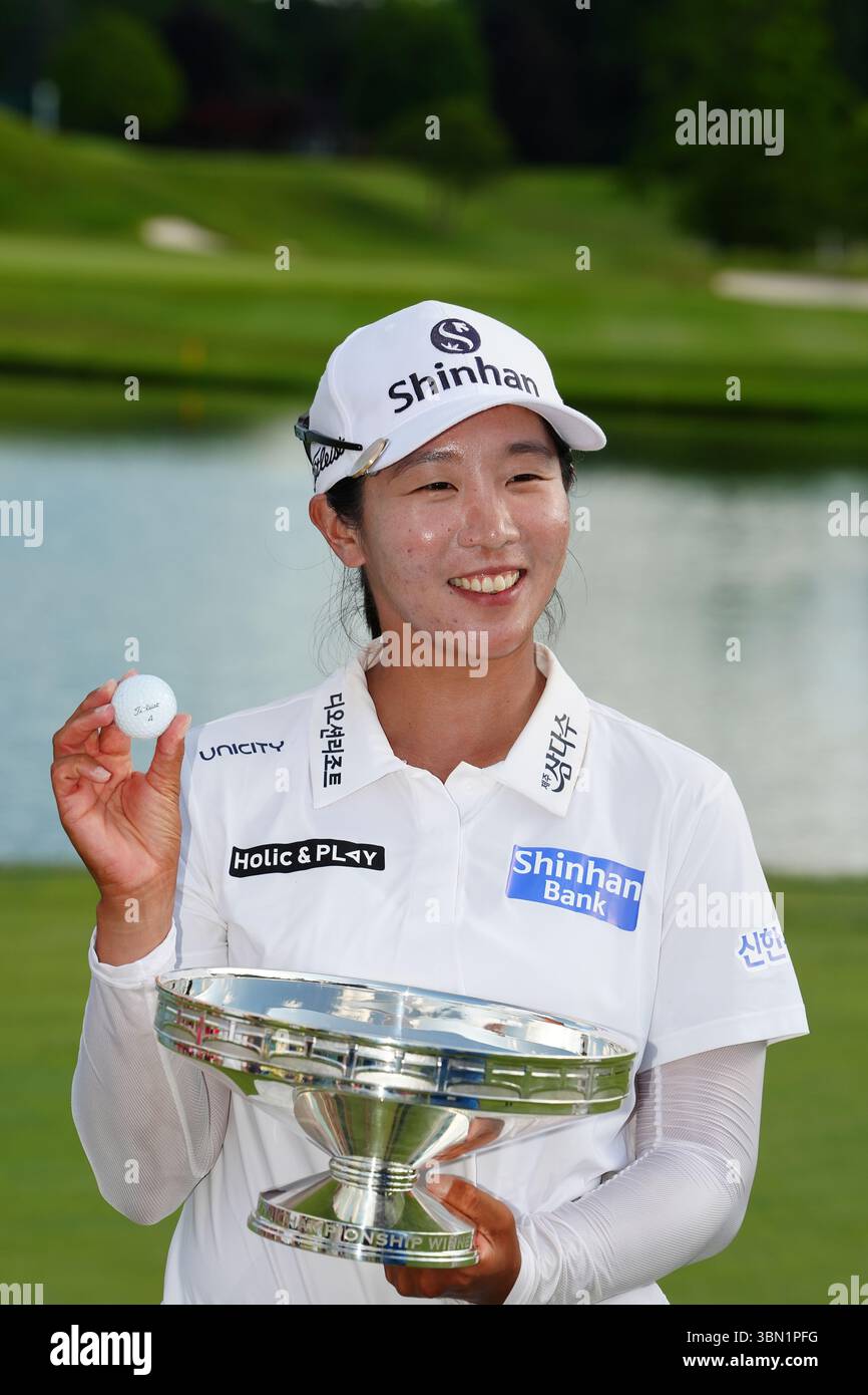 MIDLAND, MI - JUNE 29: LPGA golfer Jin Hee Im poses with trophy and ...