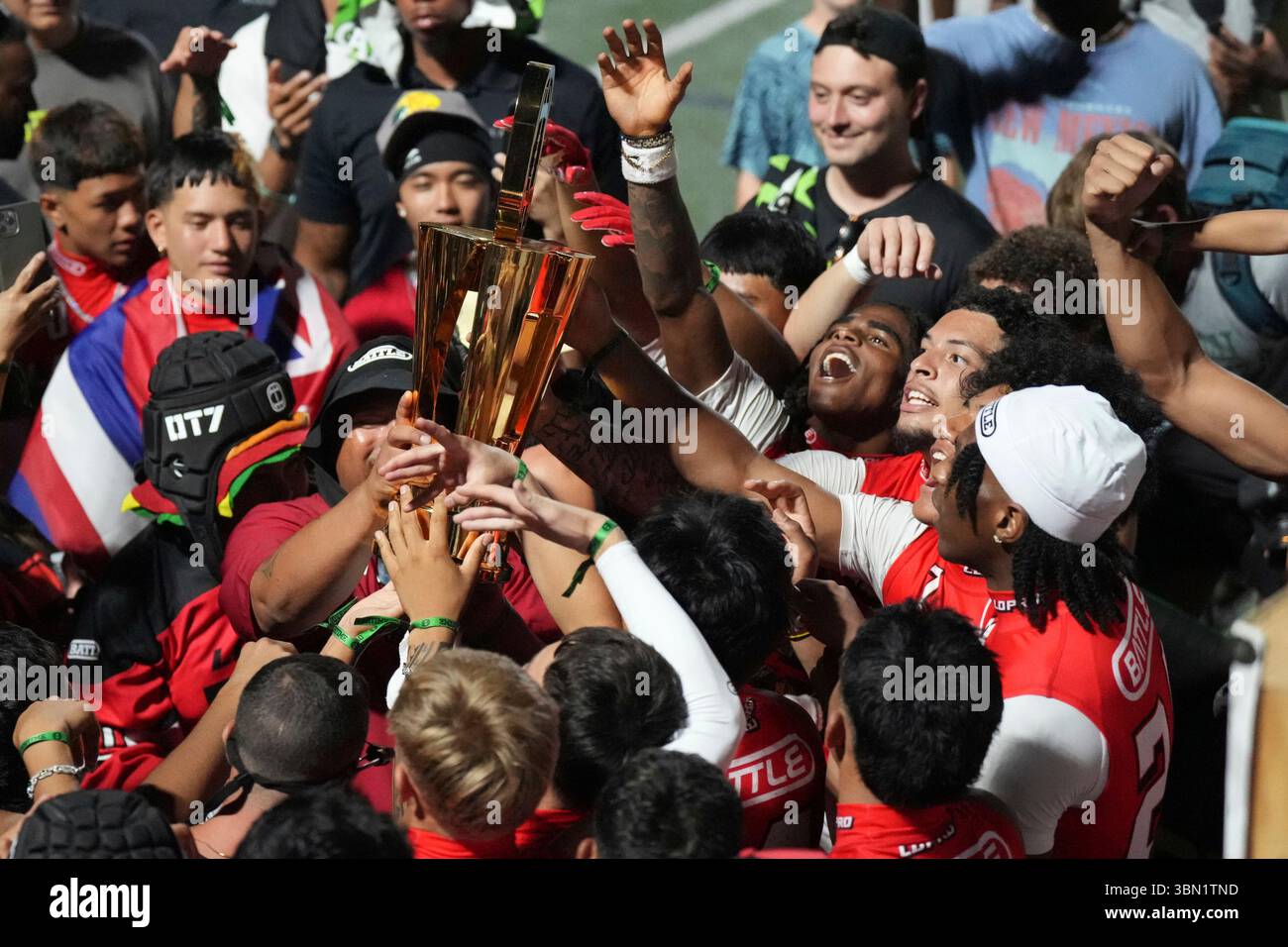 Lo-Pro players celebrate after winning the OT7 football championship ...
